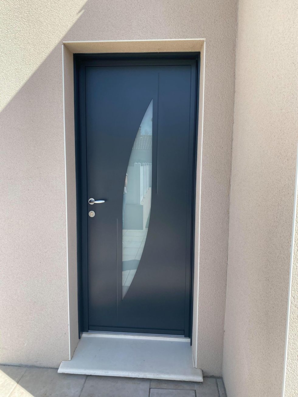 Porte d’entrée sur-mesure en acier | Concept Menuiserie